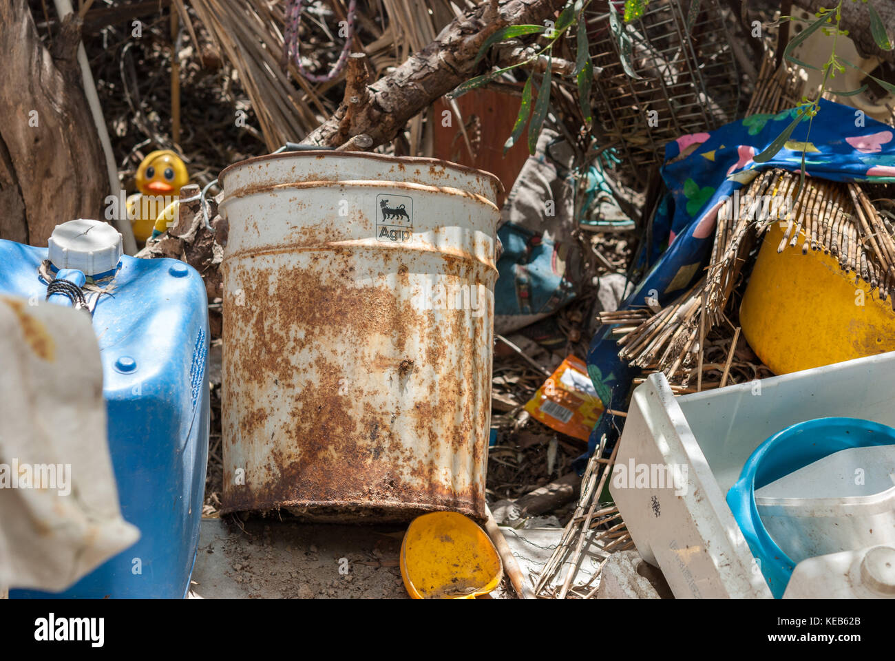 Abandoned home interior with objects on the floor - clothes and ...