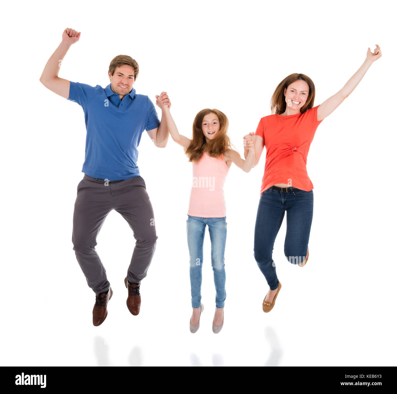 Happy Family Jumping Together Over White Background Stock Photo - Alamy