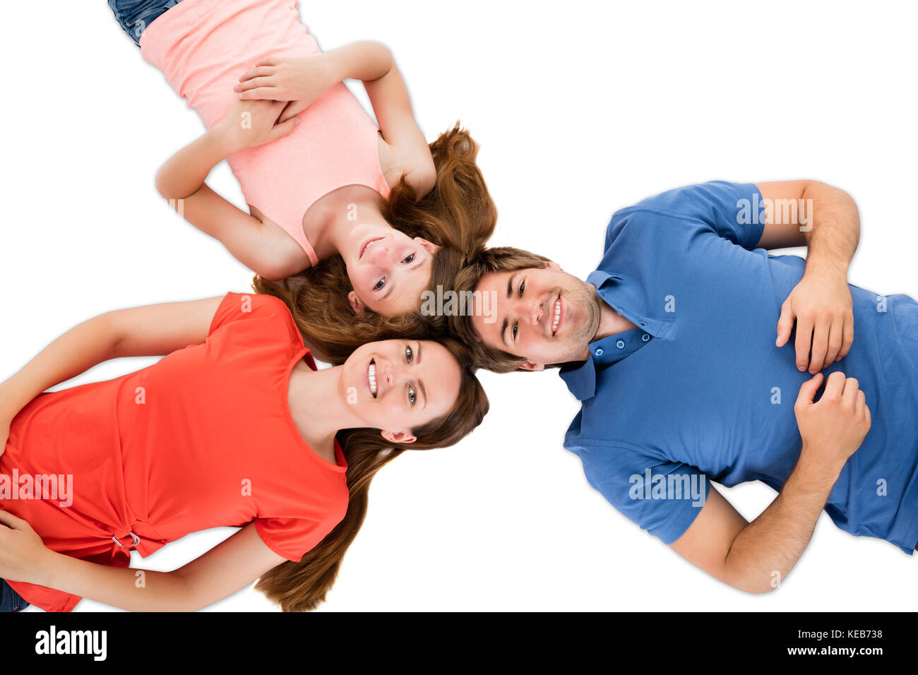 High Angle View Of A Happy Family Lying On White Background Stock Photo ...