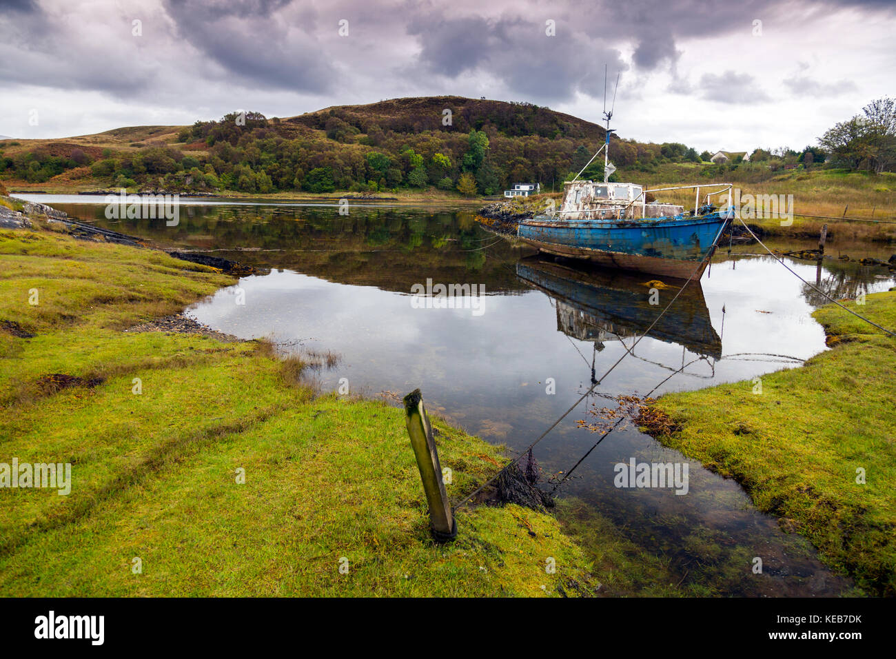 A derelict boat moored in a creek at Isleornsay on the Sleat peninsula ...