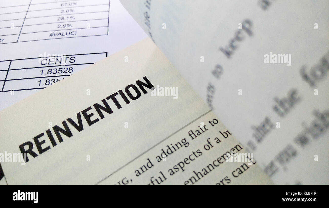 Reinvention word on the book with balance sheet as background Stock ...