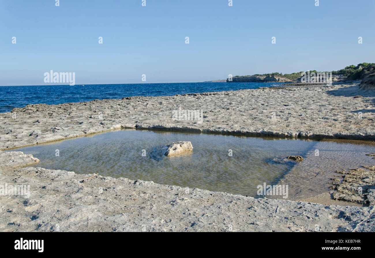 View of a pool dug in the rock Stock Photo - Alamy