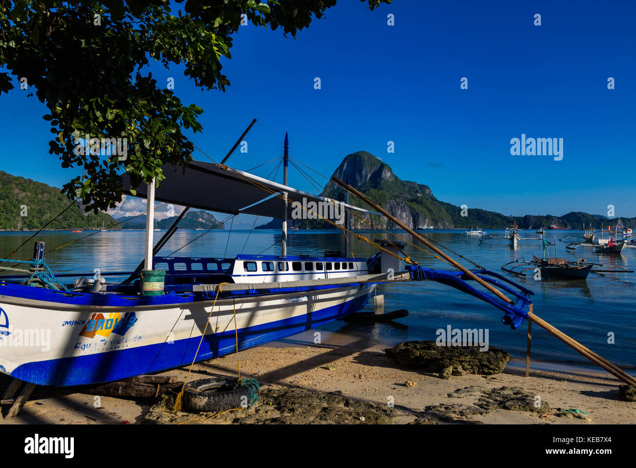Asia, Philippines, Palawan, El Nido. Early morning view across the bay ...