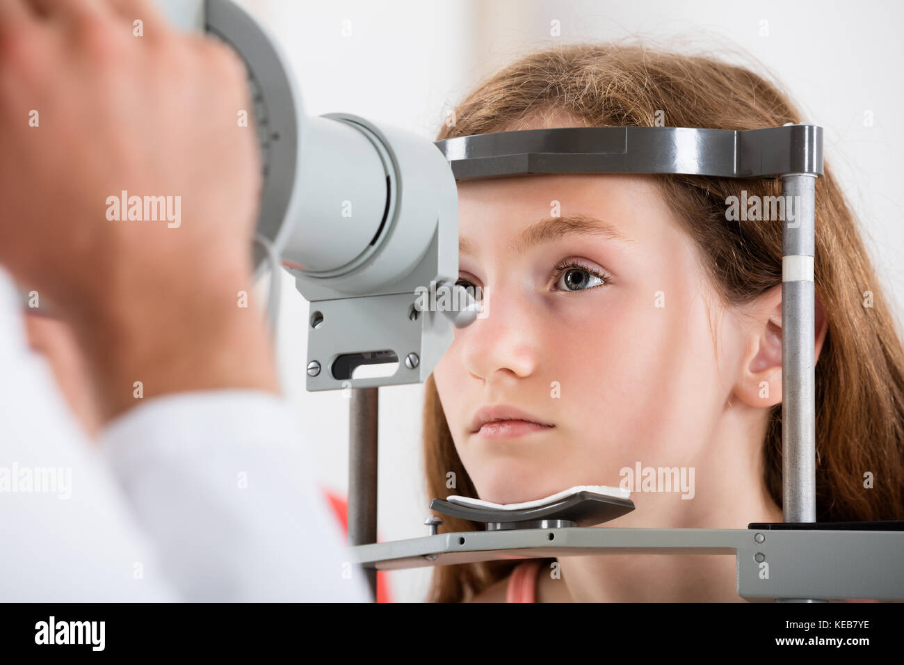 Close-up Of An Optometrist Doing Vision Testing Of Girl Stock Photo - Alamy