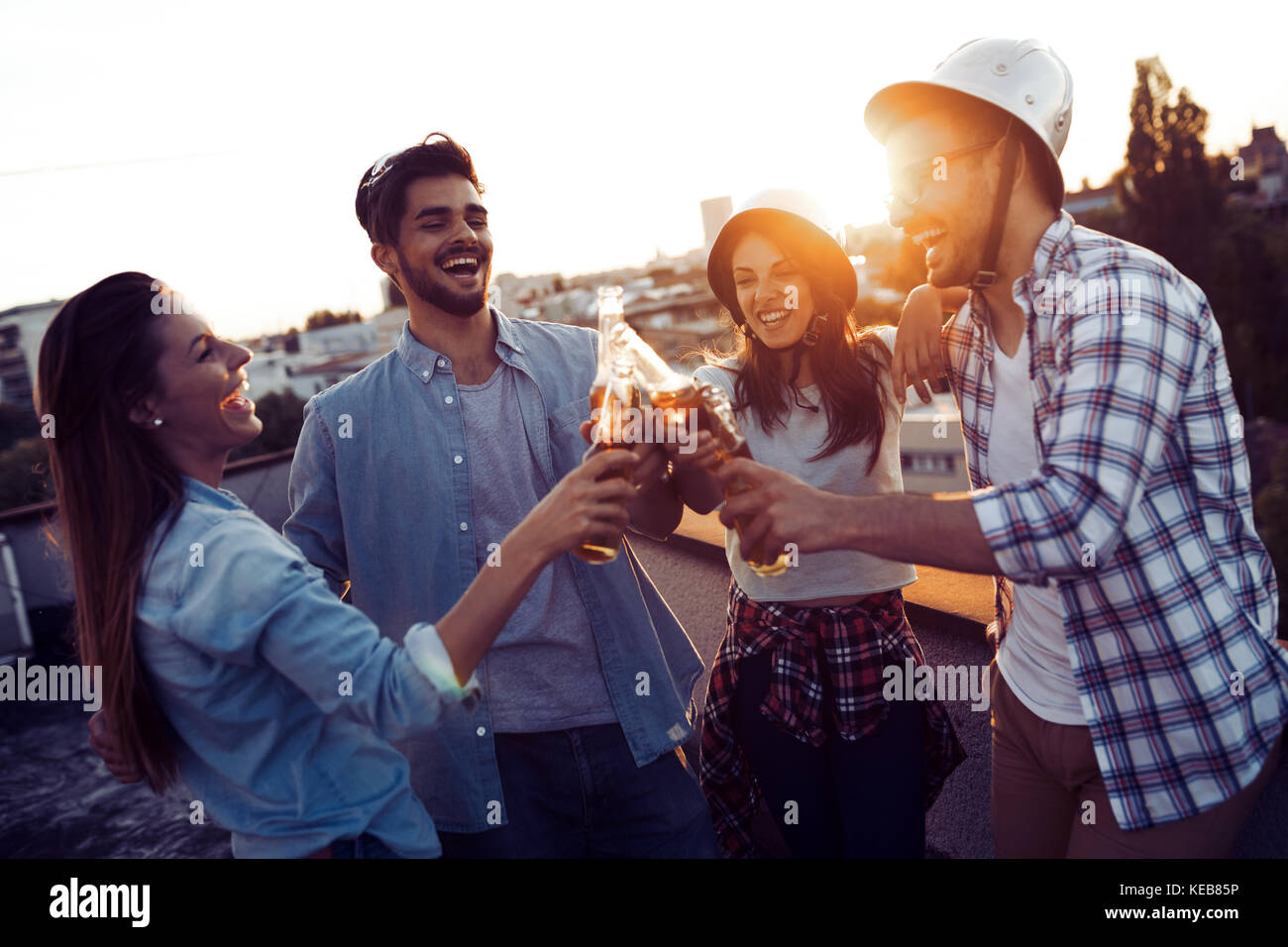 Happy cheerful friends spending fun times together Stock Photo - Alamy
