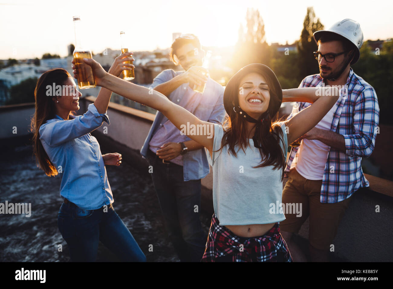 Happy cheerful friends spending fun times together Stock Photo - Alamy