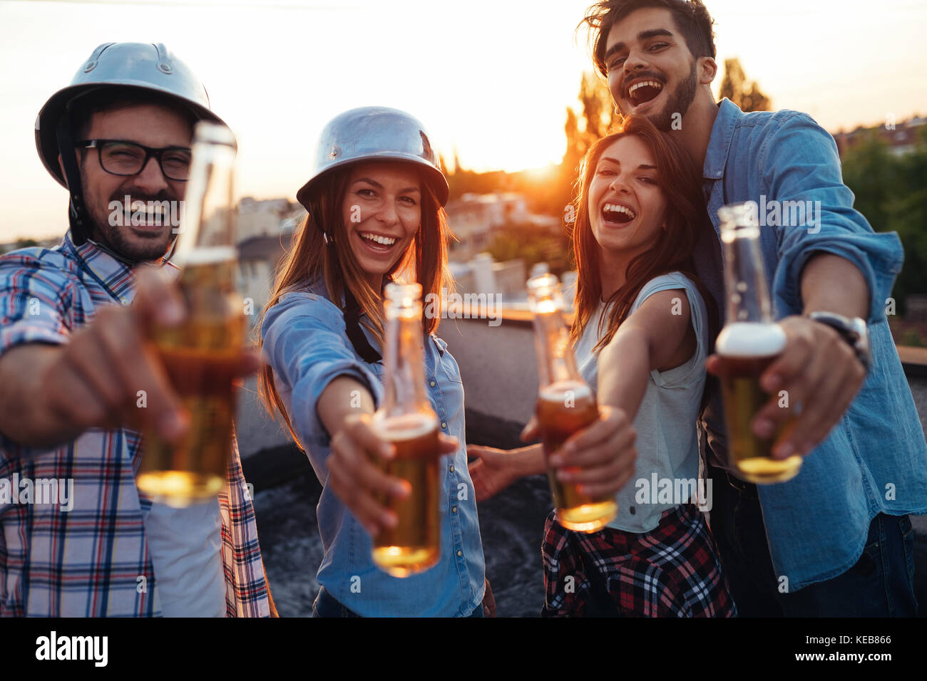 Happy cheerful friends spending fun times together Stock Photo - Alamy