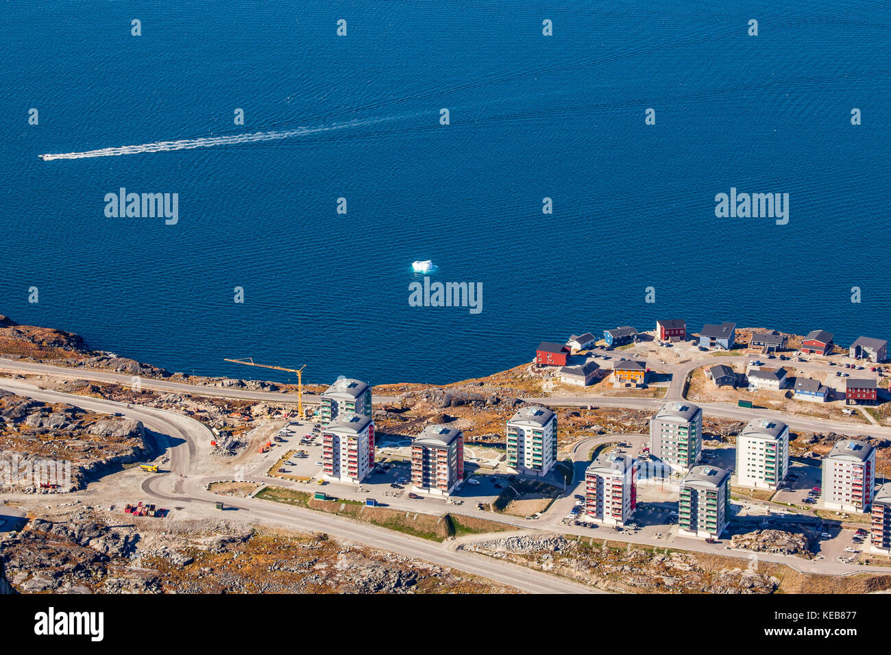 Aerial view of Nuuk city with modern streets and buildings at the fjord ...