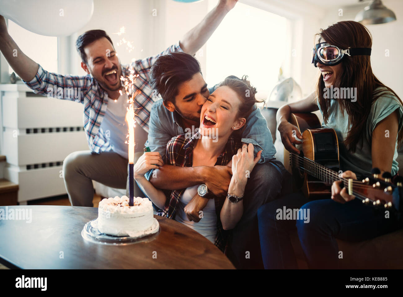 Cheerful young friends having fun on party Stock Photo - Alamy