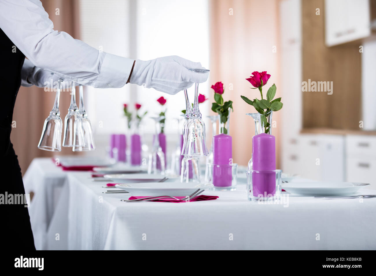 Close-up Of Waiter Setting Wedding Table At Restaurant Stock Photo - Alamy