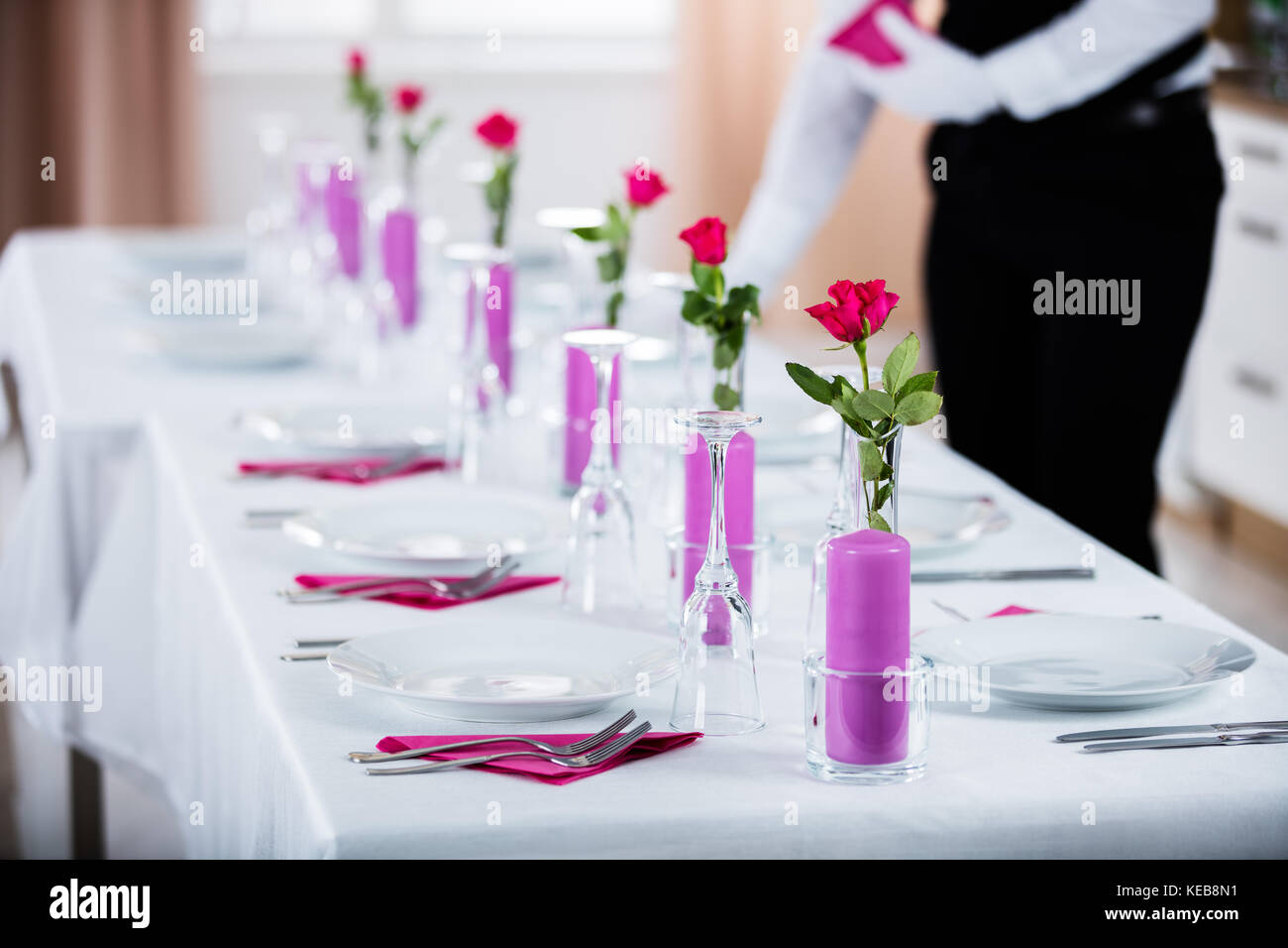 Male Waiter Placing Napkin On Wedding Table Stock Photo - Alamy