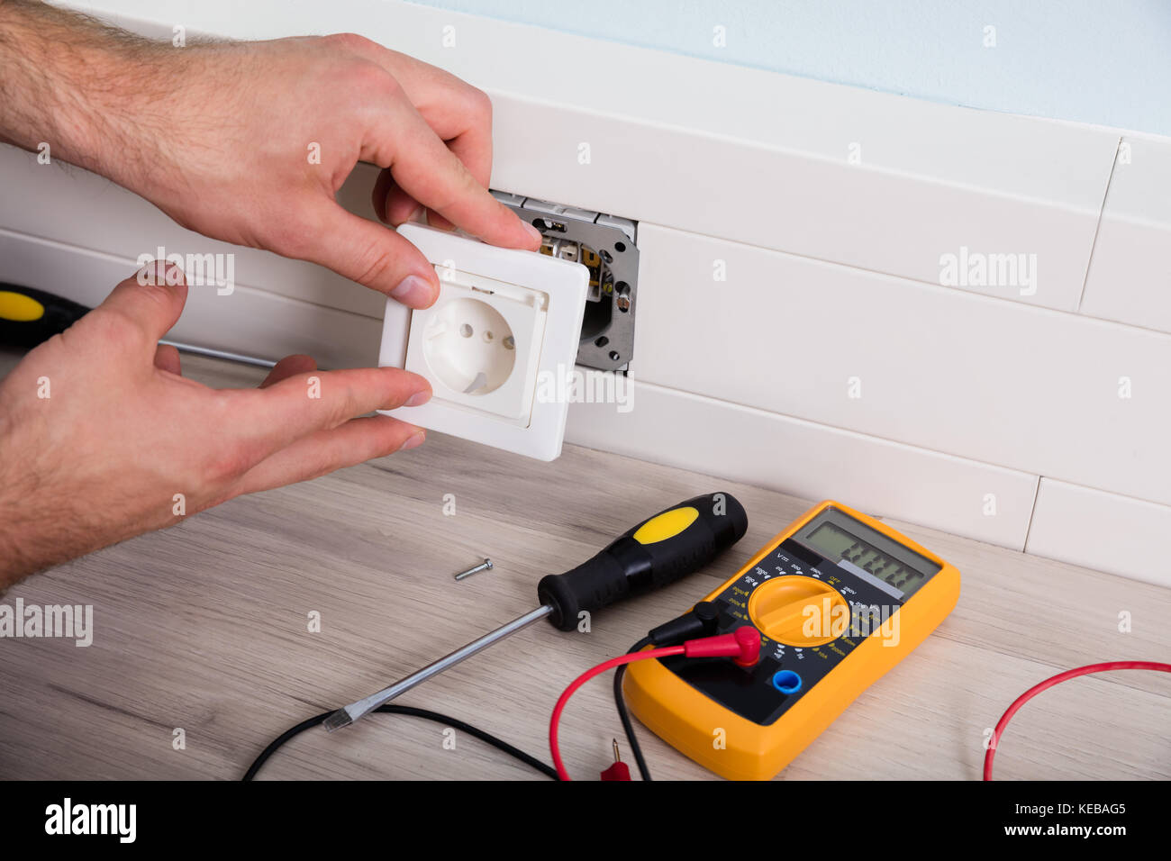 Installing socket hi-res stock photography and images - Alamy