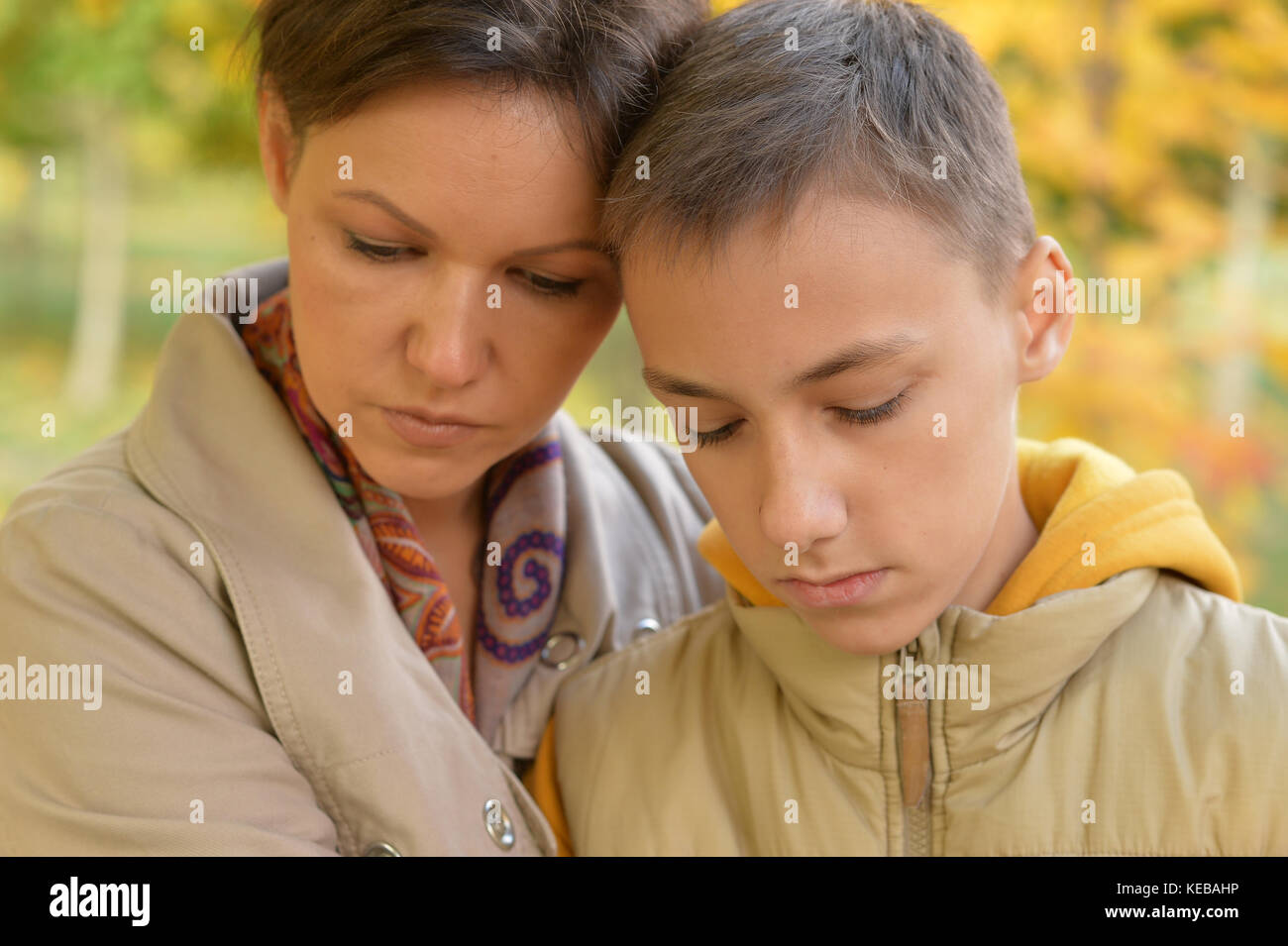 sad mother and son Stock Photo - Alamy