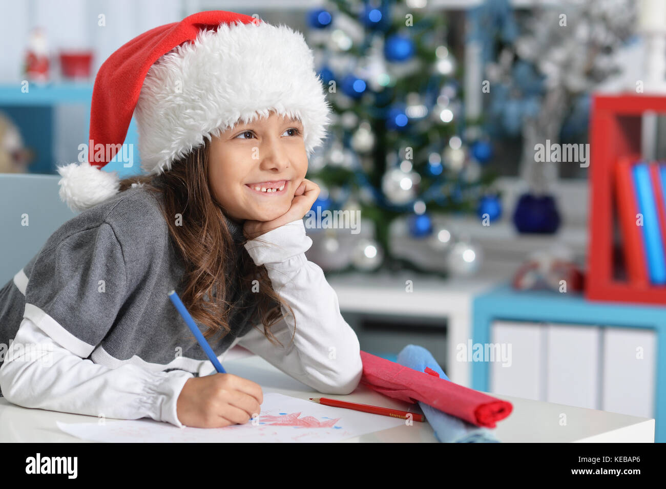 Girl writing letter Stock Photo - Alamy