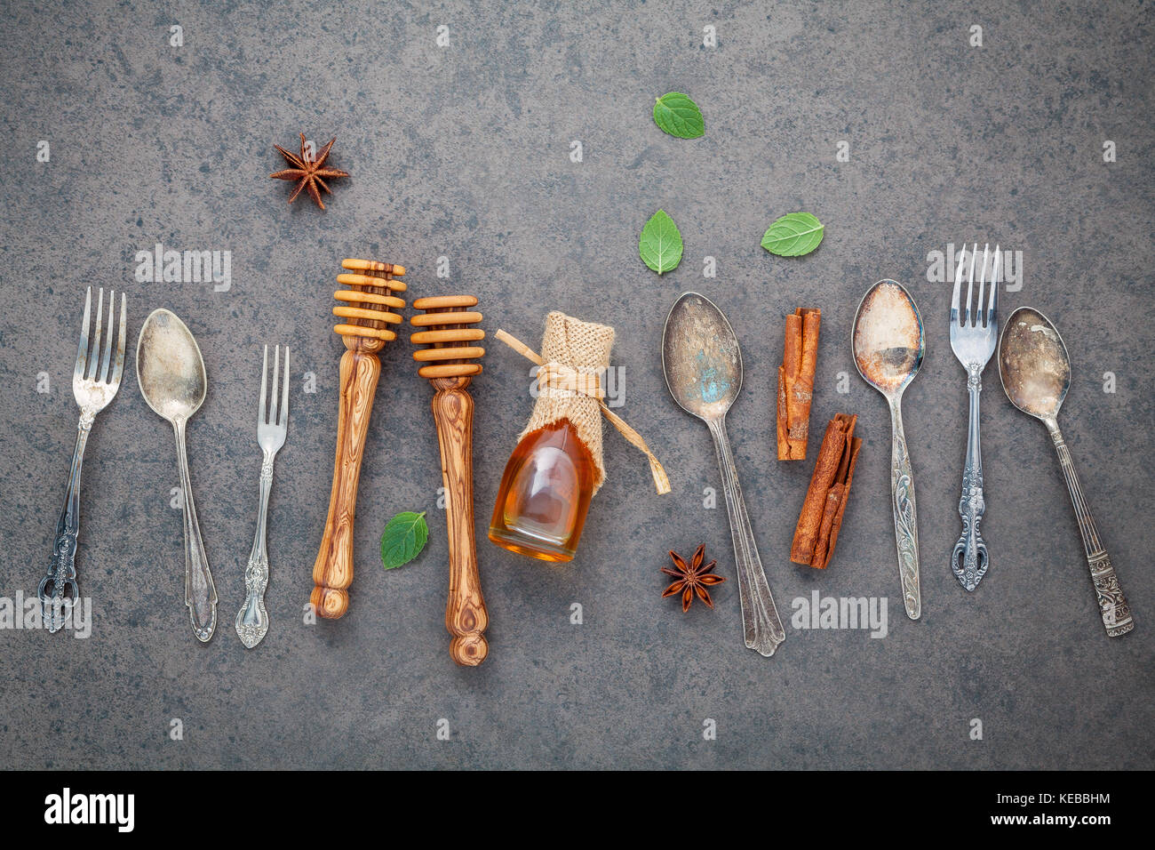 Desserts background and menu design. Metal utensils ,honey dipper ,star ...