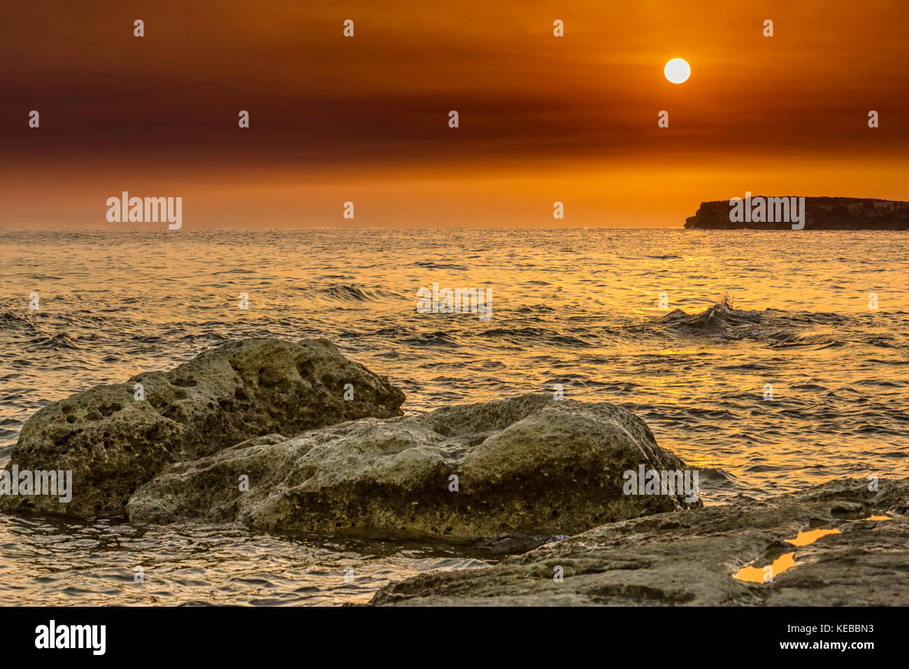 A summer sunrise over the horizon in Malta, the Mediterranean Sea Stock ...