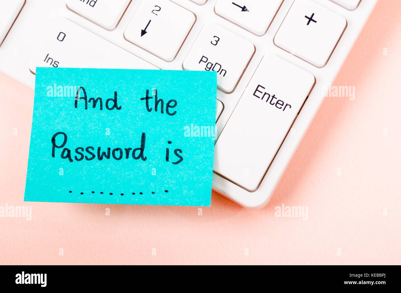 And the password is text on sticky note. with white computer keyboard ...