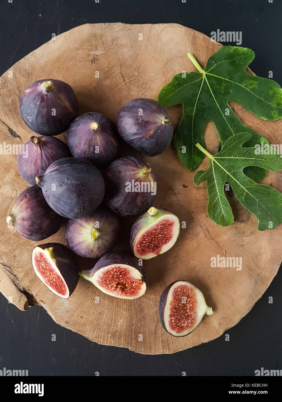 Figs on a black background Stock Photo - Alamy