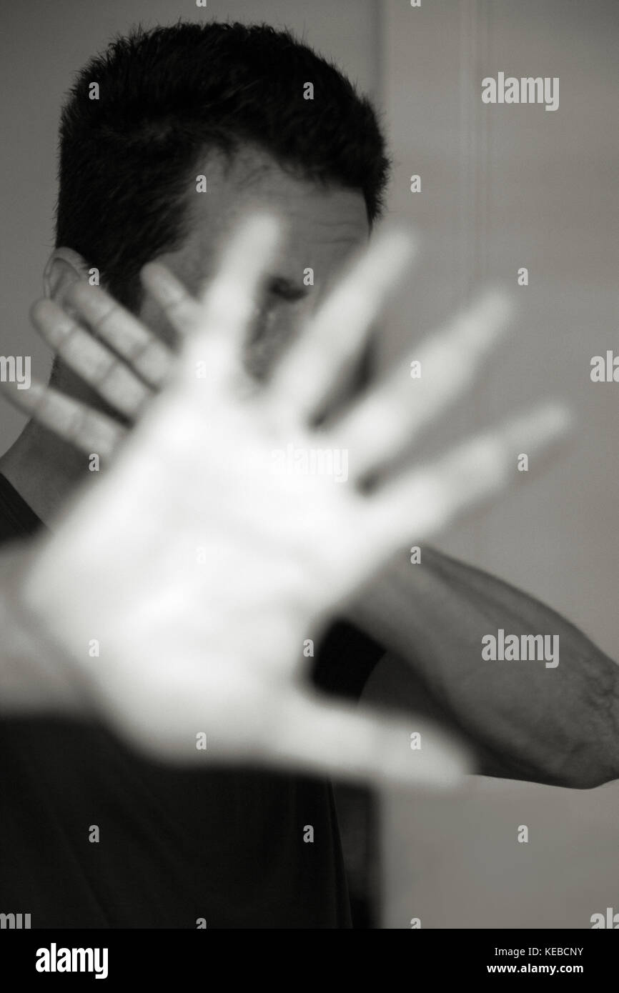 Hand blocking hi-res stock photography and images - Alamy