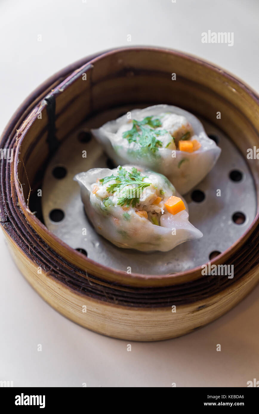 Chinese dim sum in wooden basket Stock Photo - Alamy