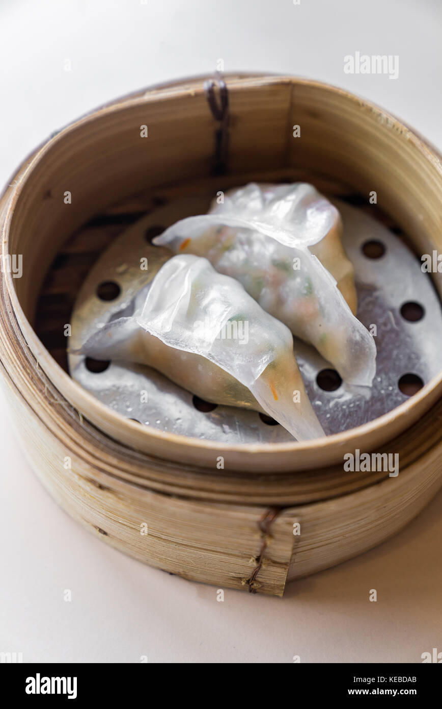 Chinese dim sum in wooden basket Stock Photo - Alamy
