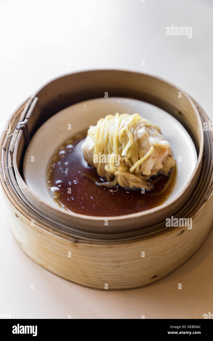 Chinese dim sum in wooden basket Stock Photo - Alamy