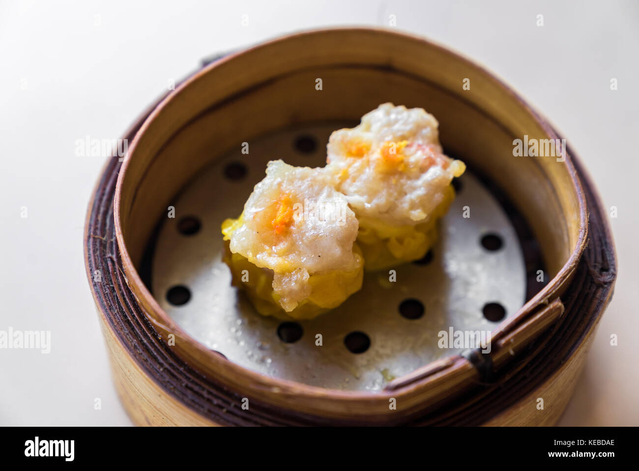 Chinese dim sum in wooden basket Stock Photo - Alamy