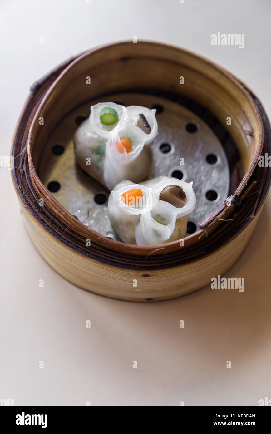 Chinese dim sum in wooden basket Stock Photo - Alamy