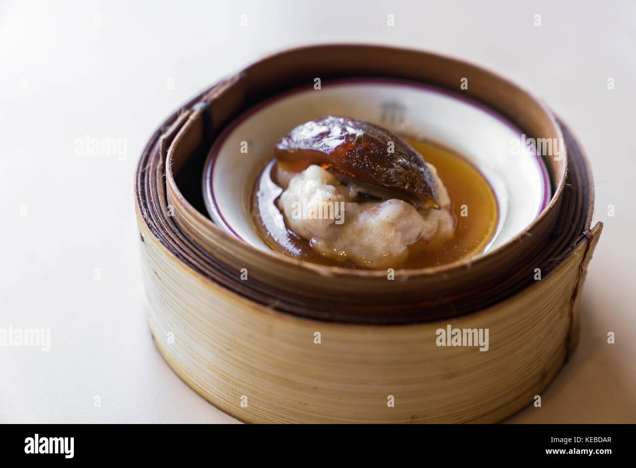 Chinese dim sum in wooden basket Stock Photo - Alamy
