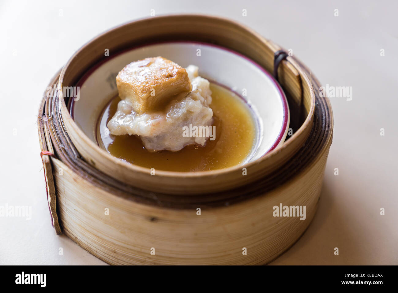 Chinese dim sum in wooden basket Stock Photo - Alamy