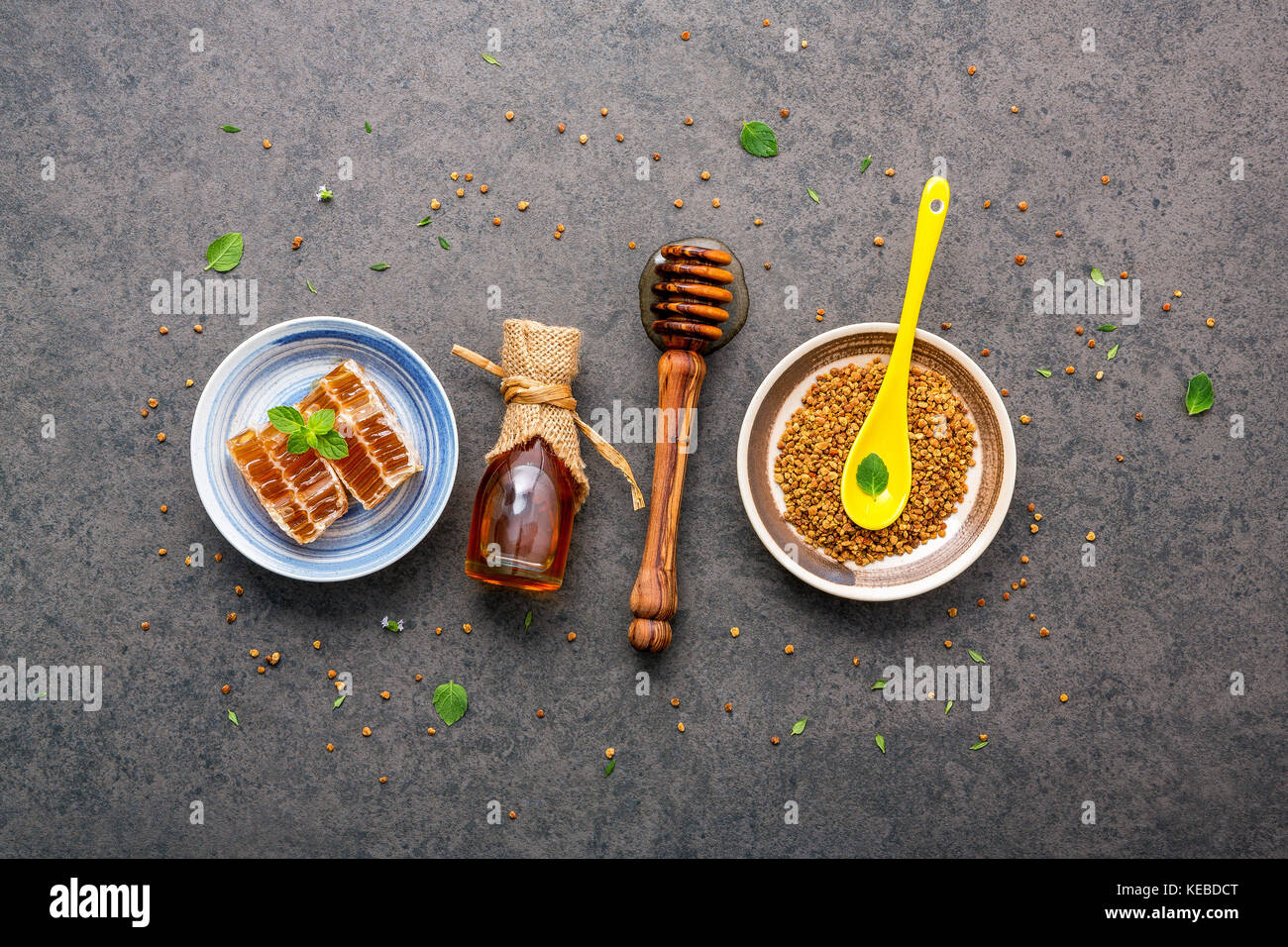 Raw organic bee pollen on dark stone background. Bee pollen granules ...