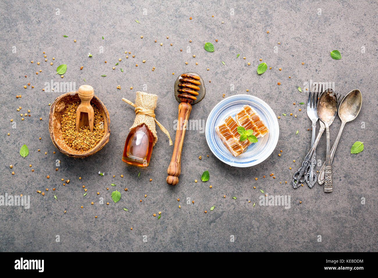 Raw organic bee pollen on dark stone background. Bee pollen granules ...