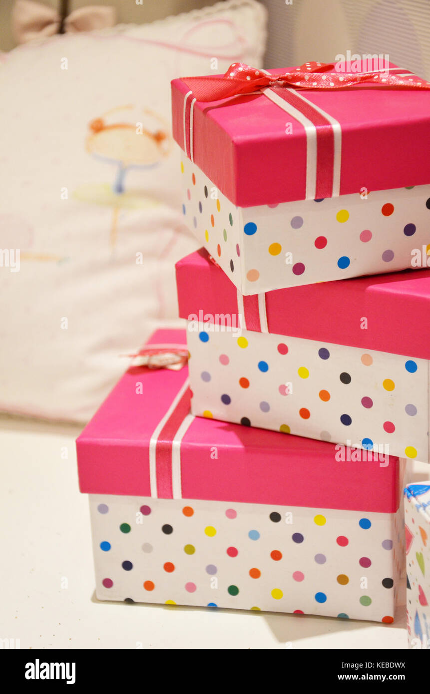Pink gift boxes stack together Stock Photo - Alamy
