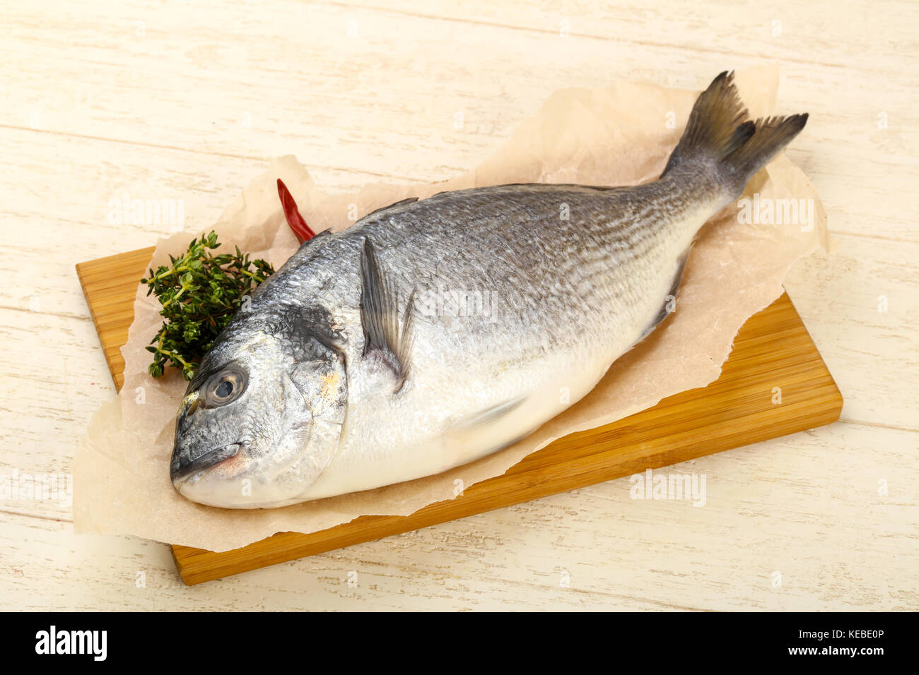 raw dorada fish - ready for cooking Stock Photo - Alamy