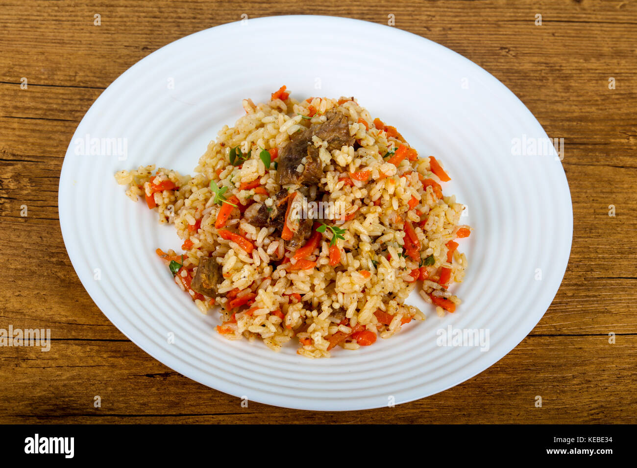 Asian rice - Plov with meat and carrot Stock Photo - Alamy