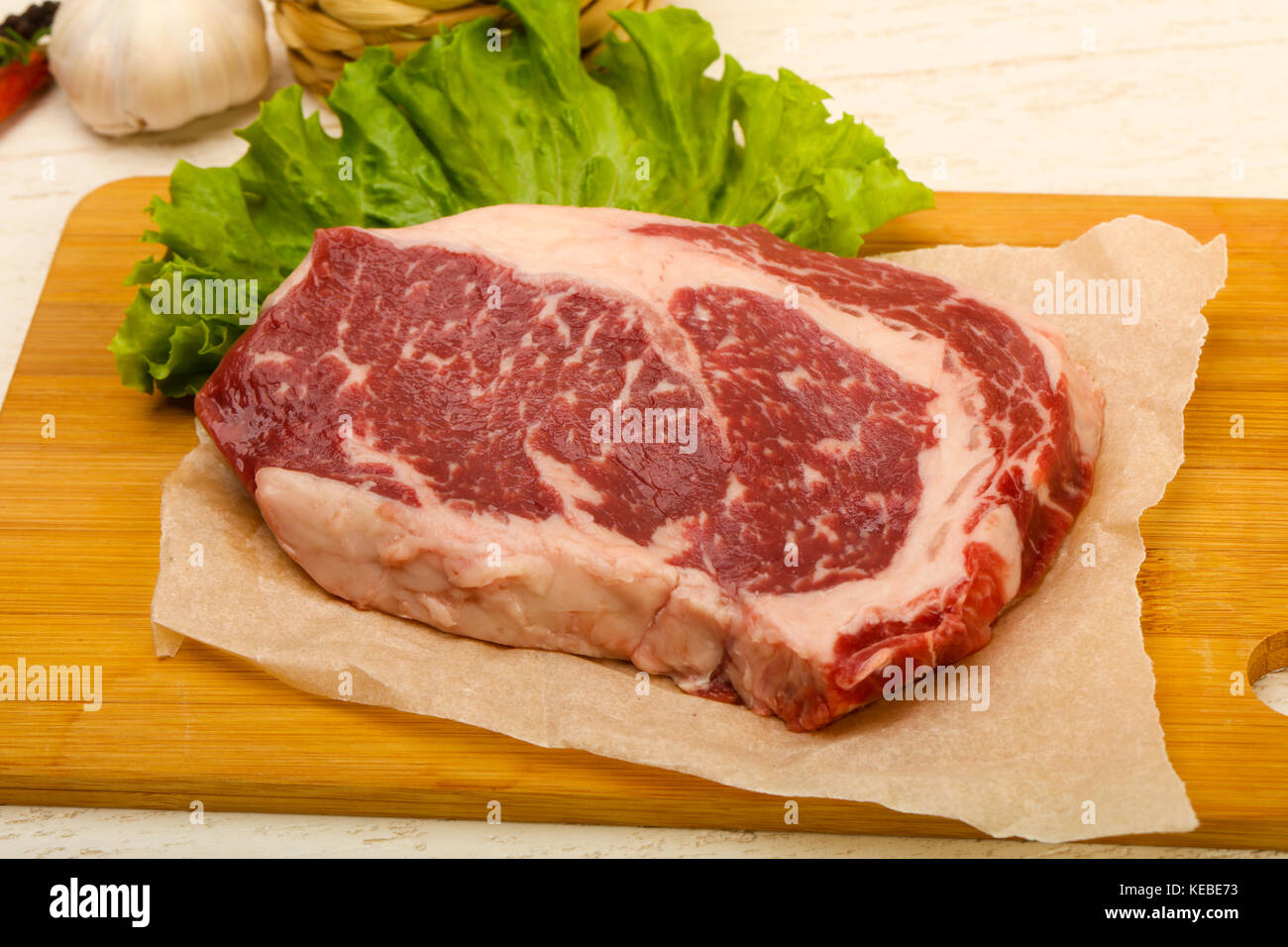 Rib eye raw steak ready for cooking Stock Photo - Alamy
