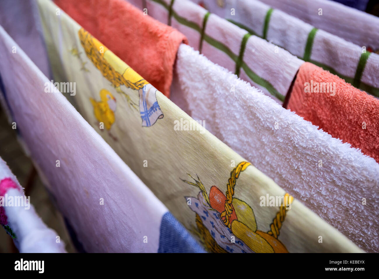 Close up colorful laundry drying Stock Photo - Alamy
