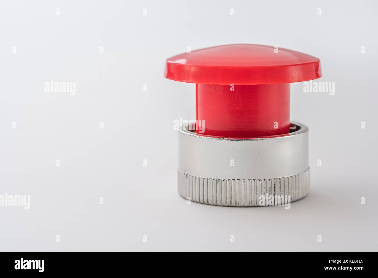 Big red button on light background - metaphor for 'Finger on the Button ...