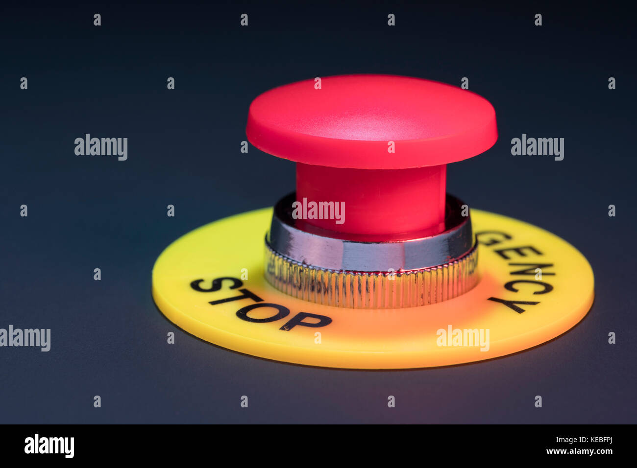 Big red button on dark background - metaphor for 'Finger on the Button ...