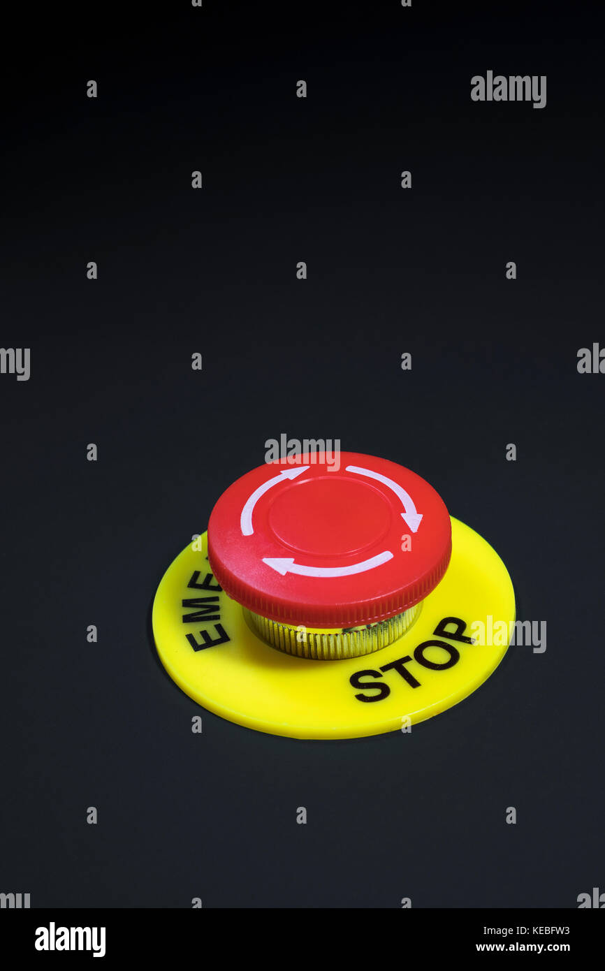 Big red button on dark background - metaphor for 'Finger on the Button ...