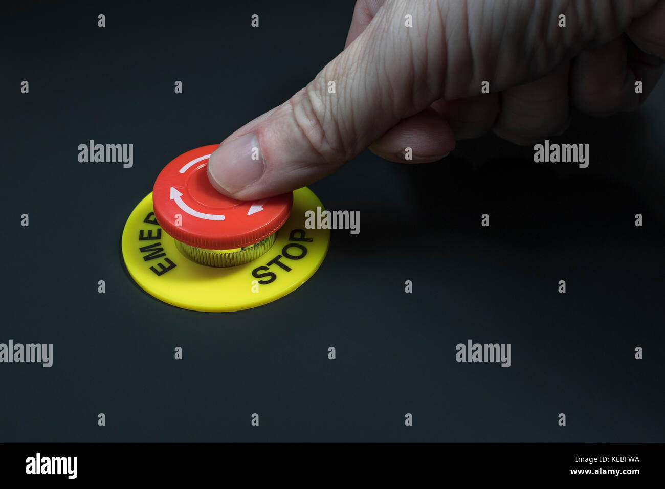 Big red button on dark background - metaphor for 'Finger on the Button ...