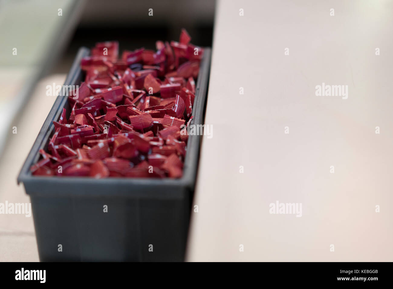 red sachets with sugar in a box Stock Photo - Alamy