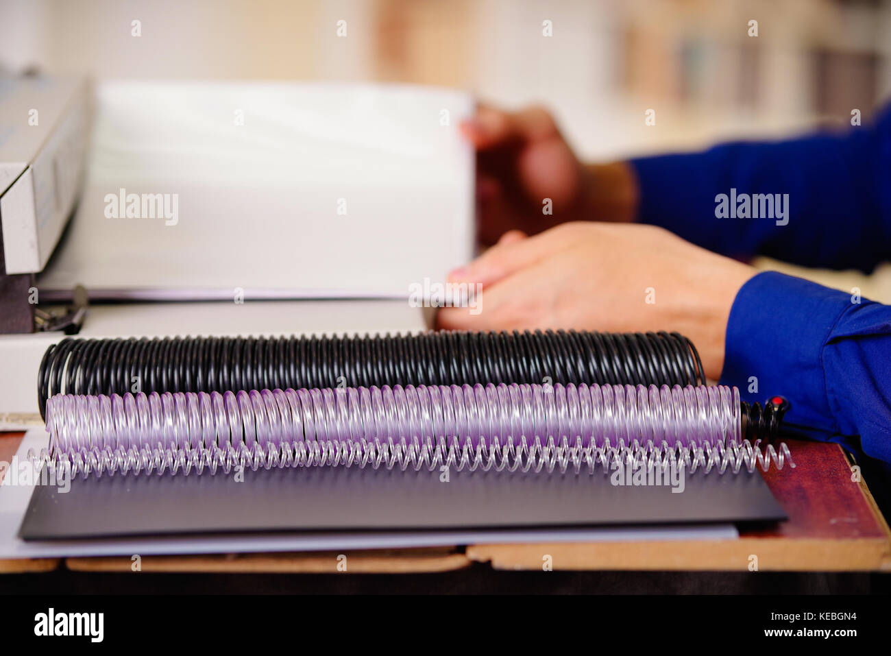 Cose up of plastic ring of different sizes and colors used for binding ...