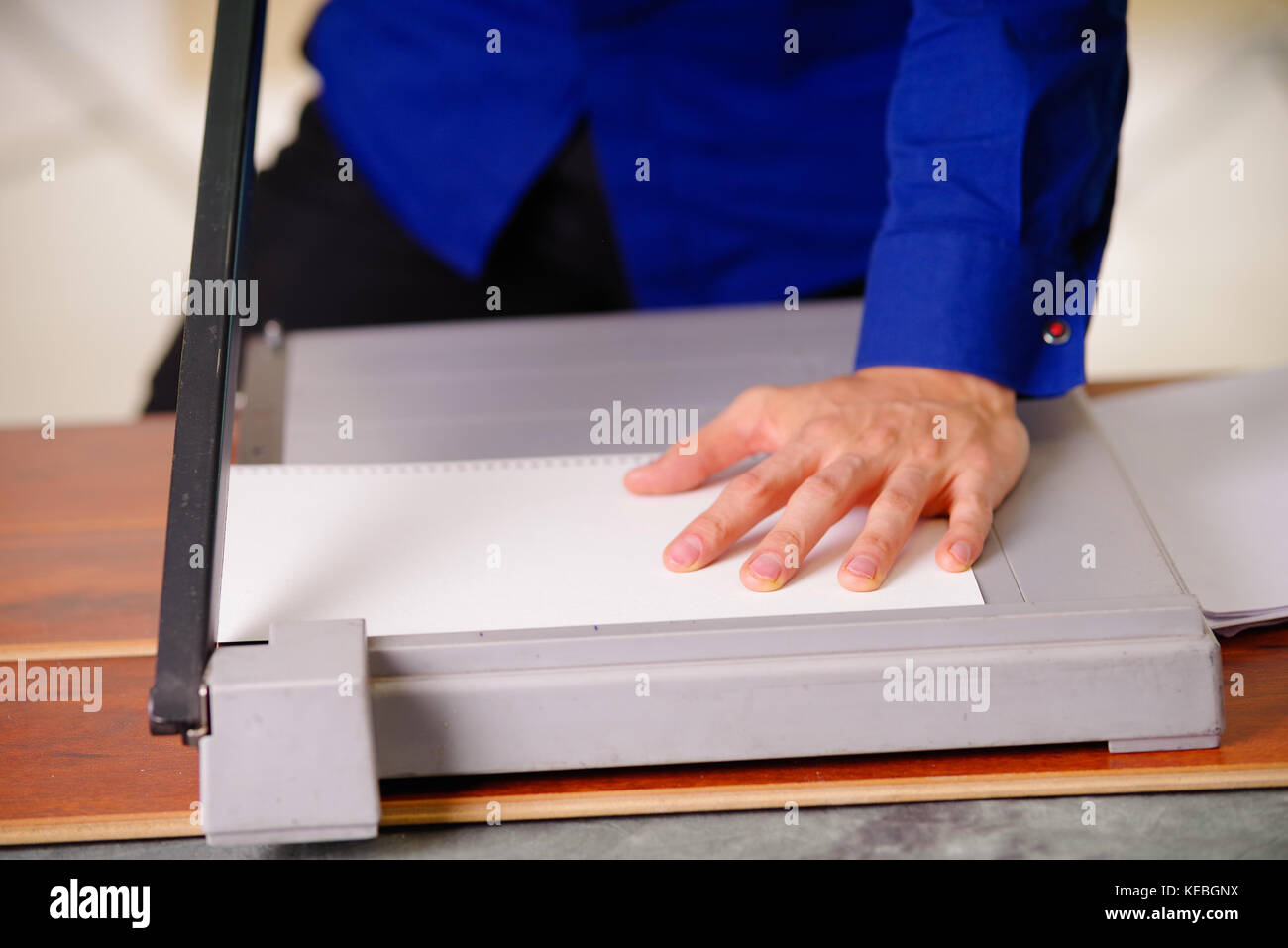 Close up of hand man over the guillotine, working on the guillotine ...