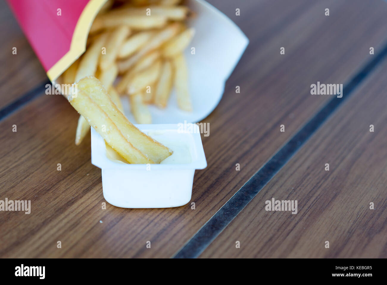Fast food. French fries and sauce Stock Photo - Alamy