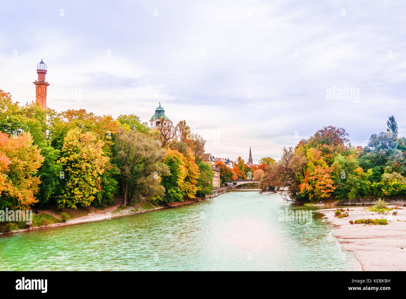 View on Isar river an colorful trees in autumn landscape in Munich ...