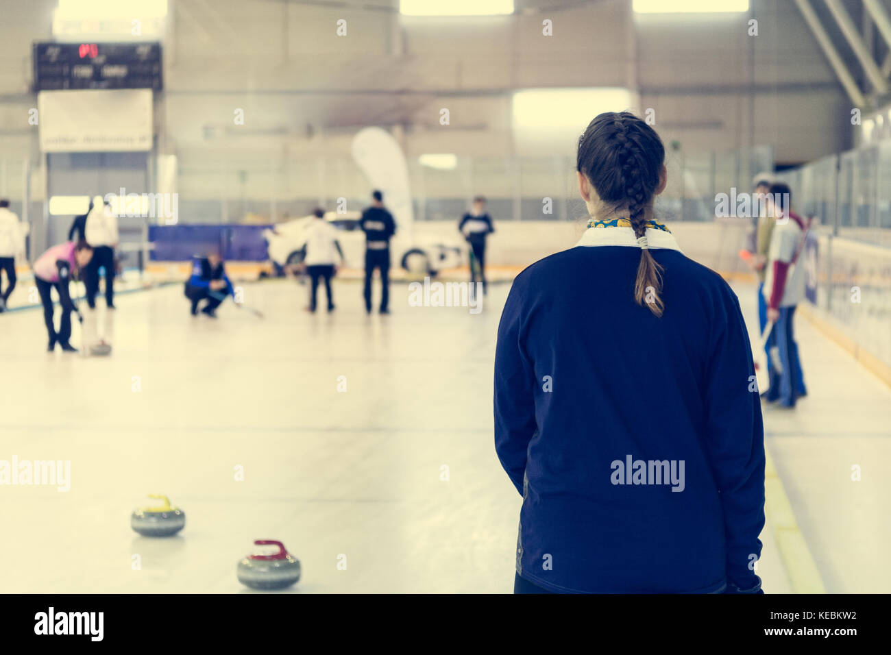 Playing a game of curling Stock Photo - Alamy