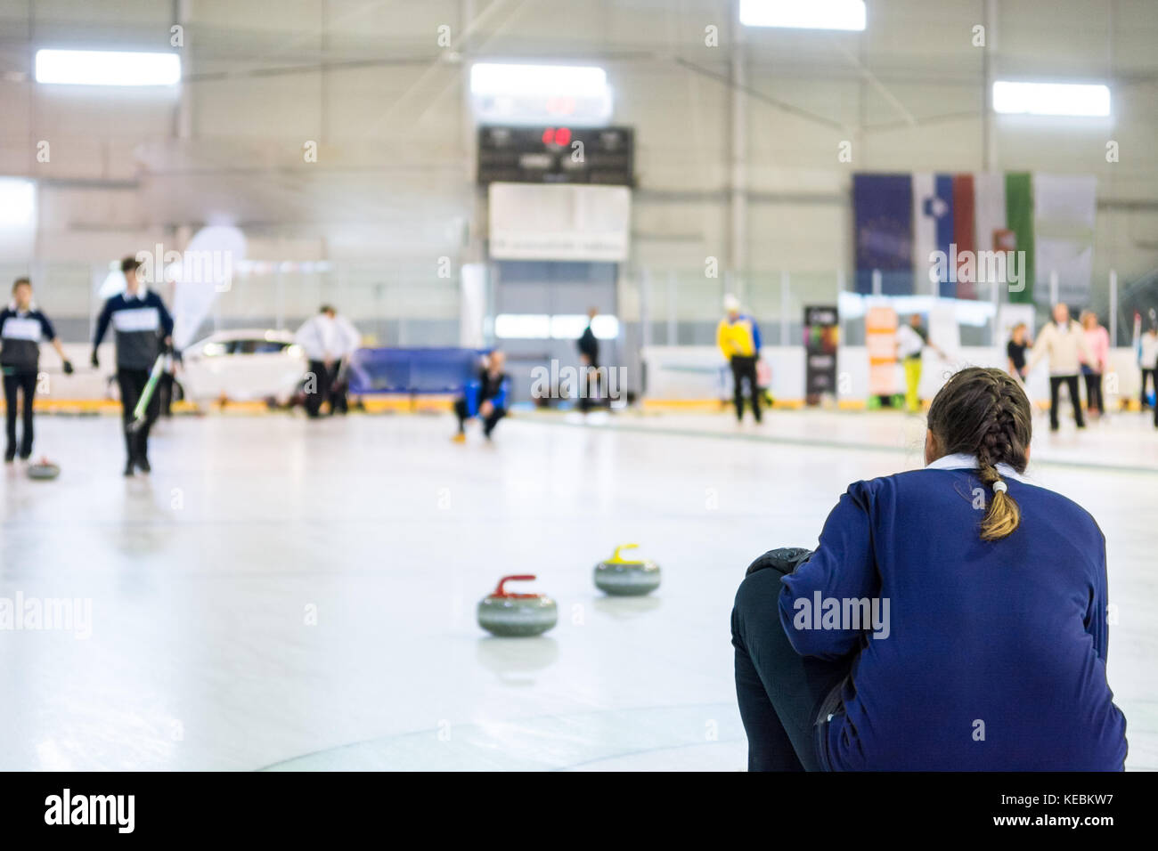 Playing a game of curling Stock Photo - Alamy