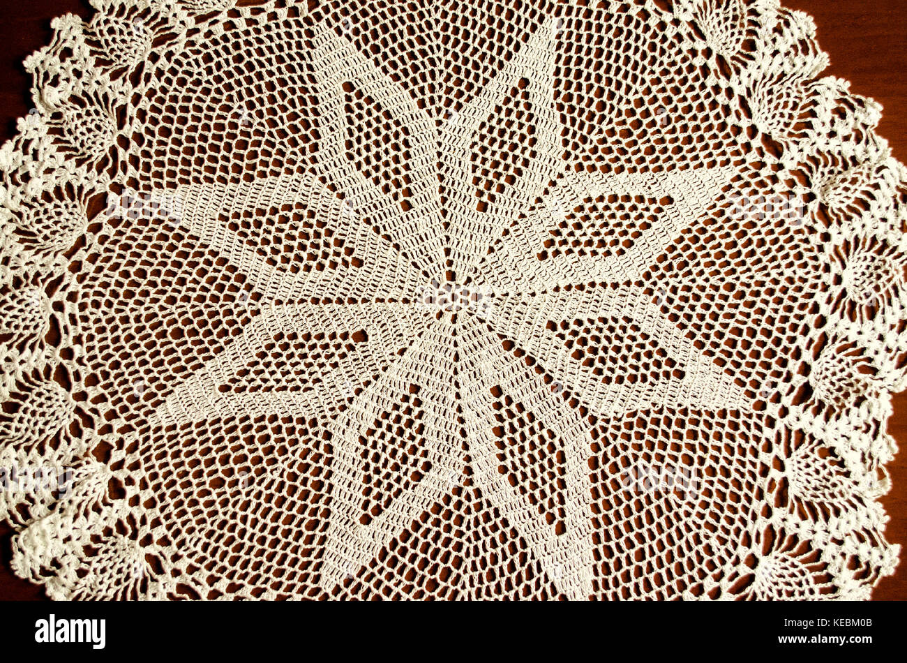 Large white napkin with geometric pattern crocheted from cotton yarn ...