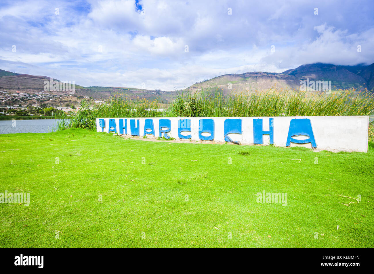 View of the Yahuarcocha lake and instalations, from a boat in the ...